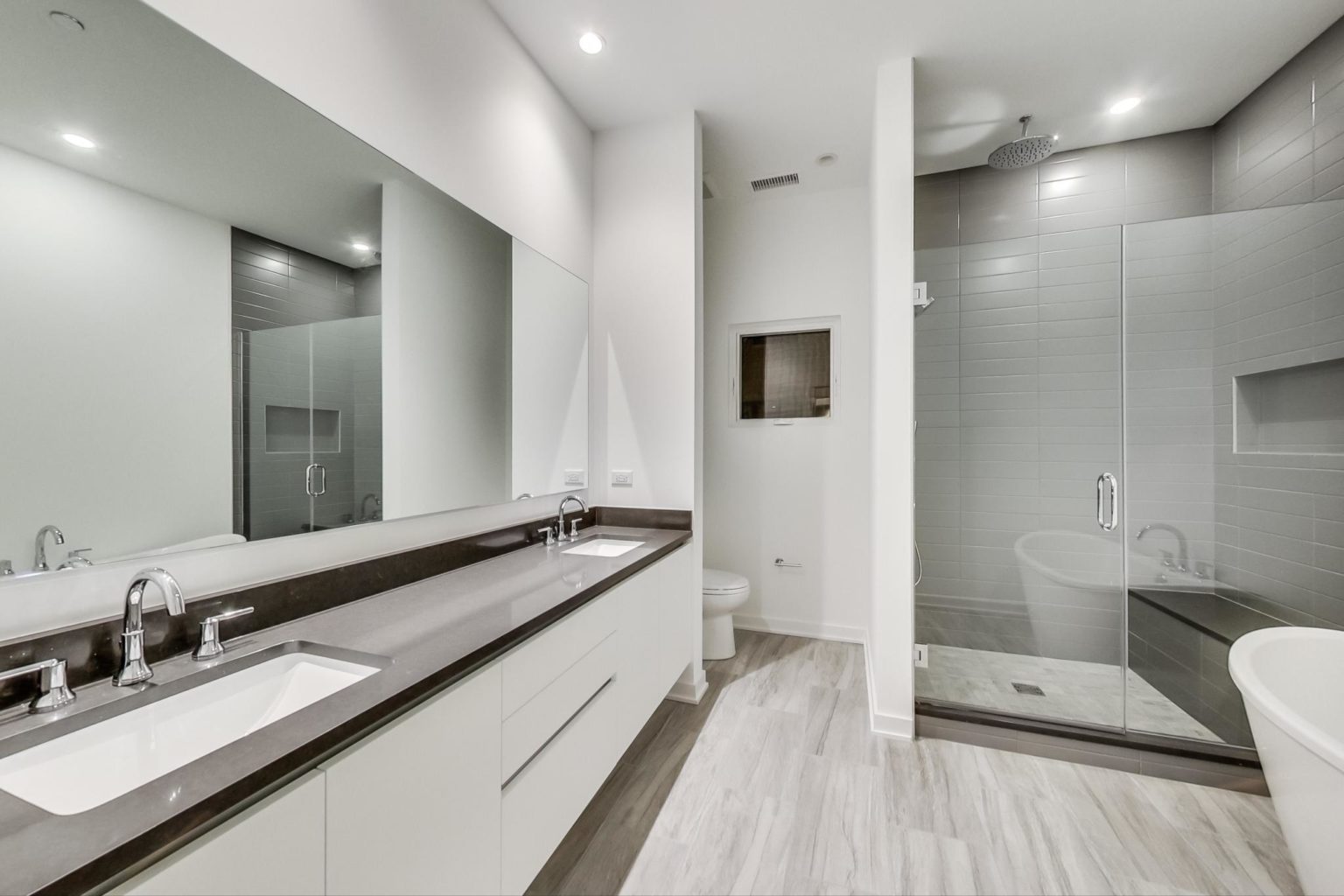 Modern Primary Bathroom Design with Bold Wallpaper