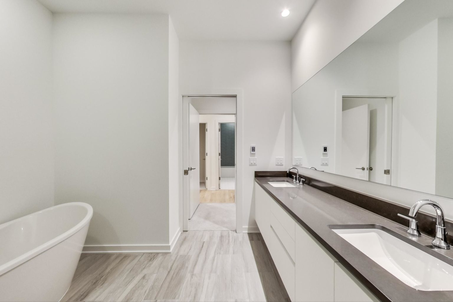 Modern Primary Bathroom Design with Bold Wallpaper